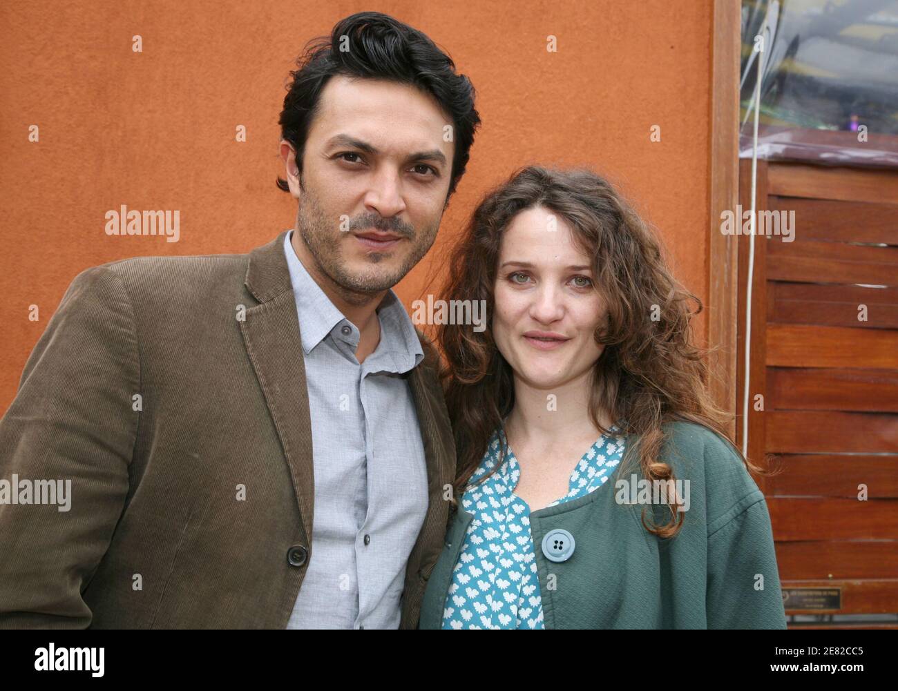Actor Olivier Sitruk and his wife arrive in the 'Village', the VIP area ...