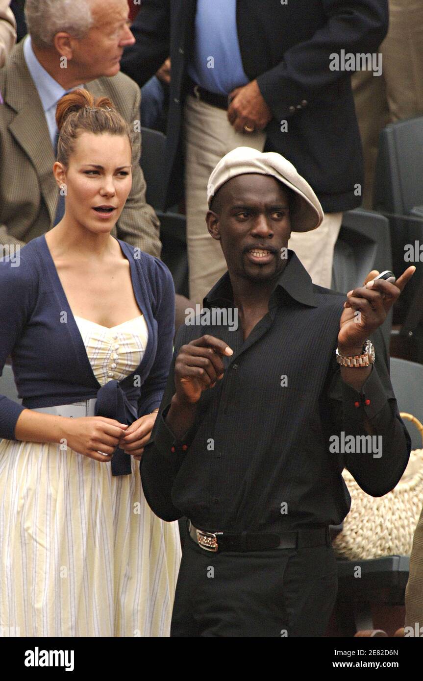 Pascal Gentil and his girlfriend attend the women semi-final of Roland ...