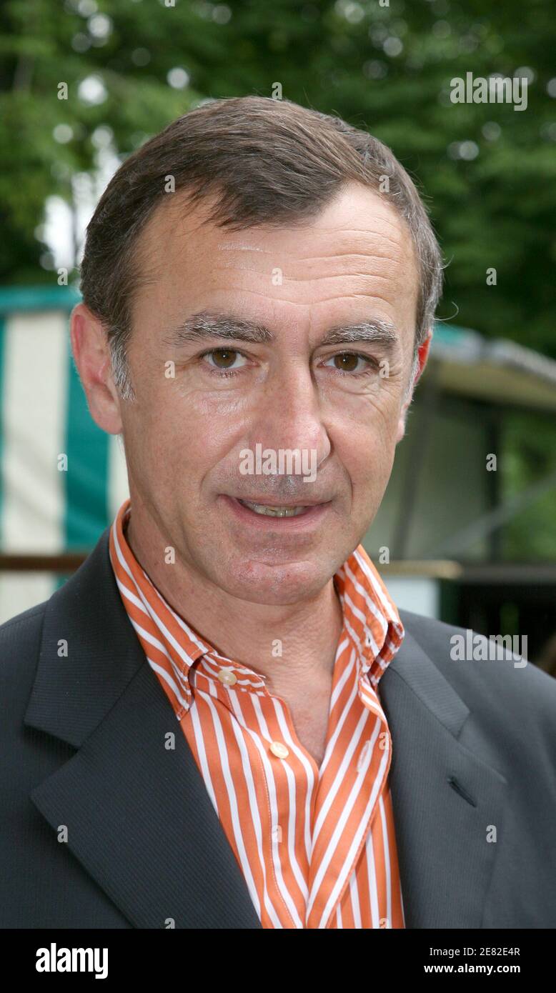 French actor Christophe Malavoy arrives in the 'Village', the VIP area ...