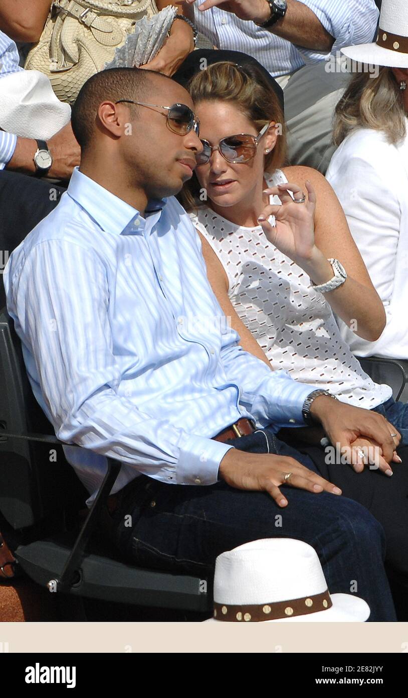 French football player Thierry Henry and his wife Nicole attend the men ...