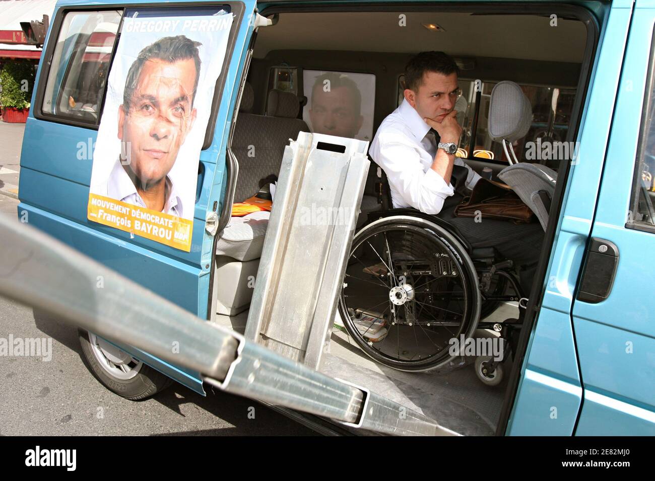 Gregory Perrin poses in his own car in Paris, France, on June 6, 2007 ...