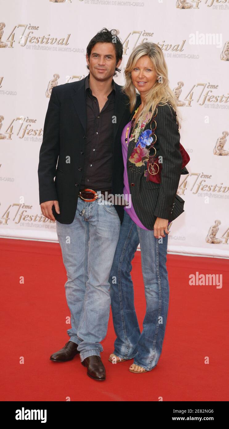 Filip Nikolic and his girlfriend pose for pictures at the Grimaldi ...