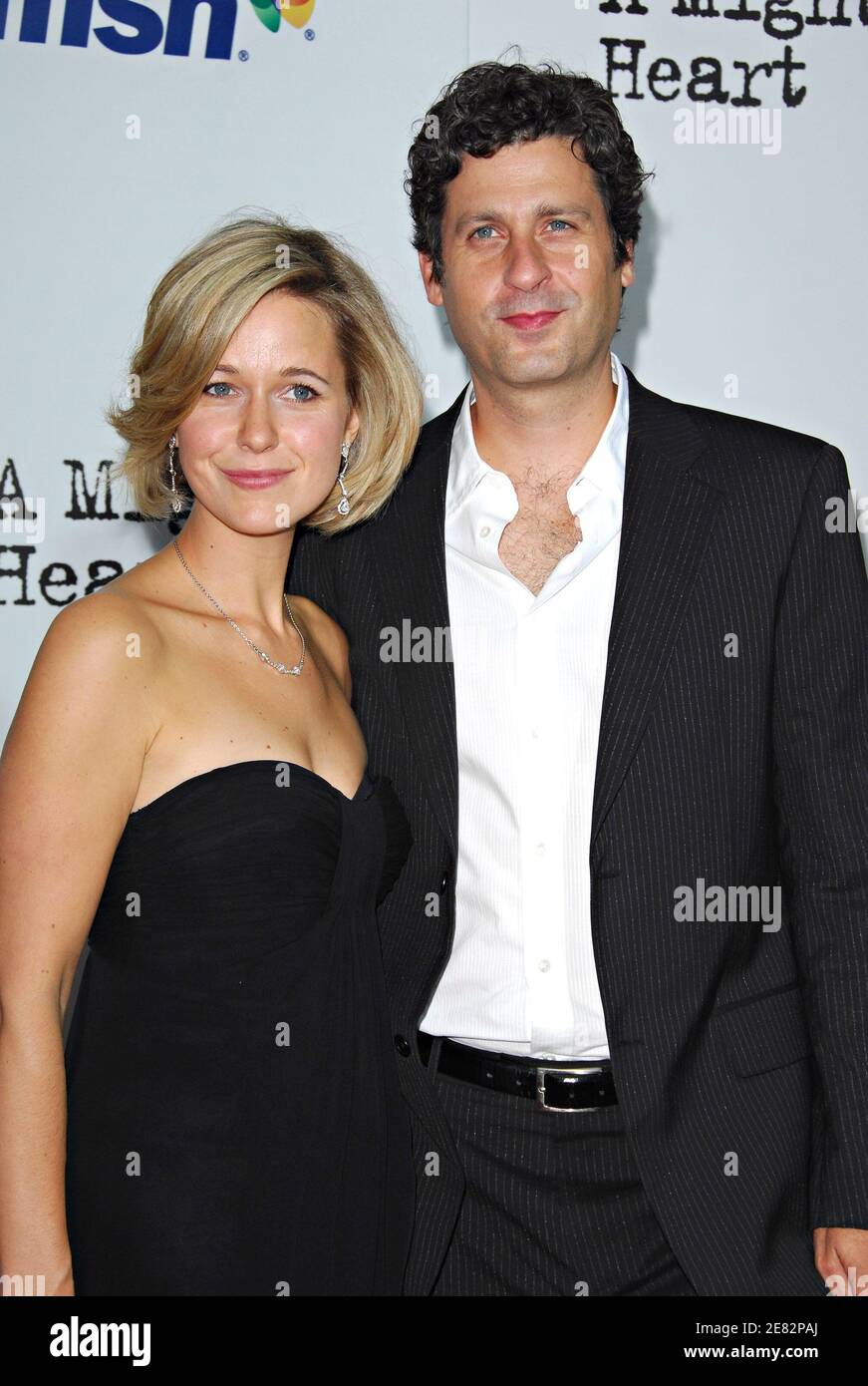 Actor Gary Wilmes and wife attend the premiere of A Mighty Heart held ...