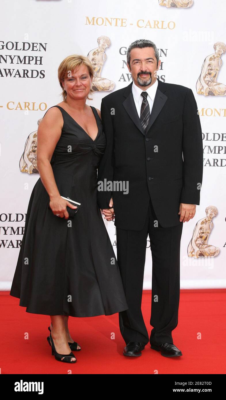 US director Jon Cassar and his wife pose for pictures during the ...