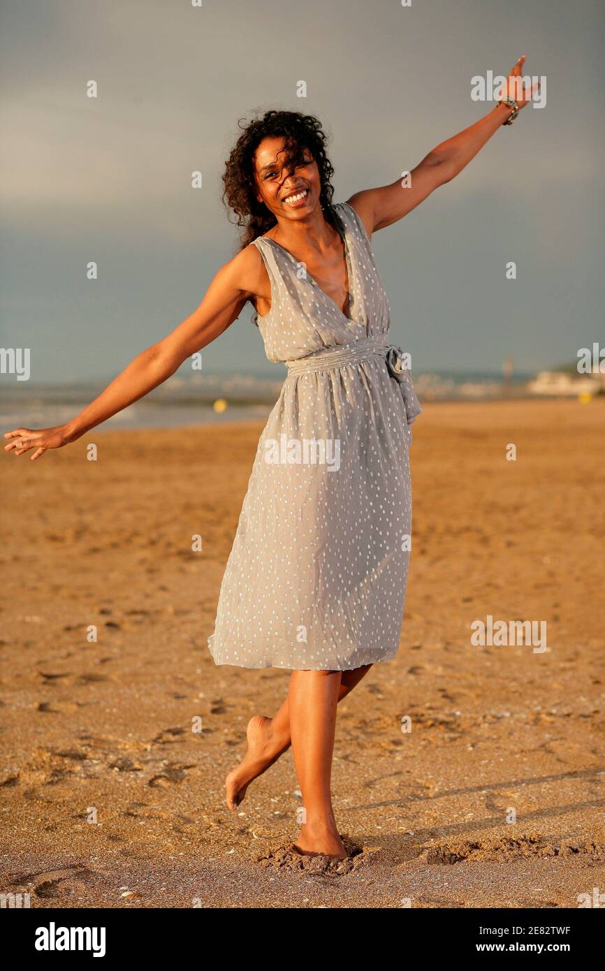 French actress Sarah Martens poses for photographers on the beach ...