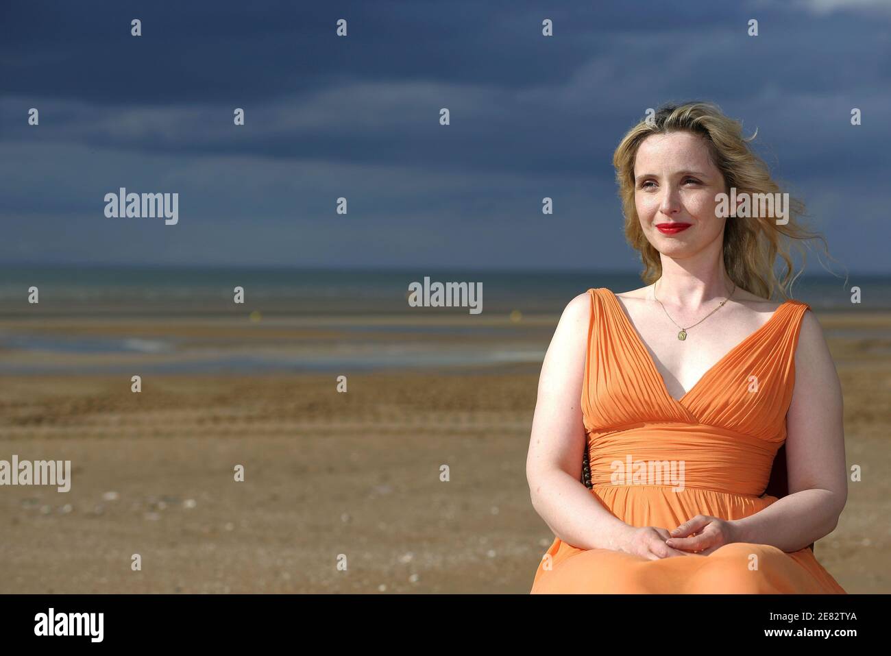 French Actress Julie Delpy Poses For Photographers On The Beach During The 21th Cabourg Romantic