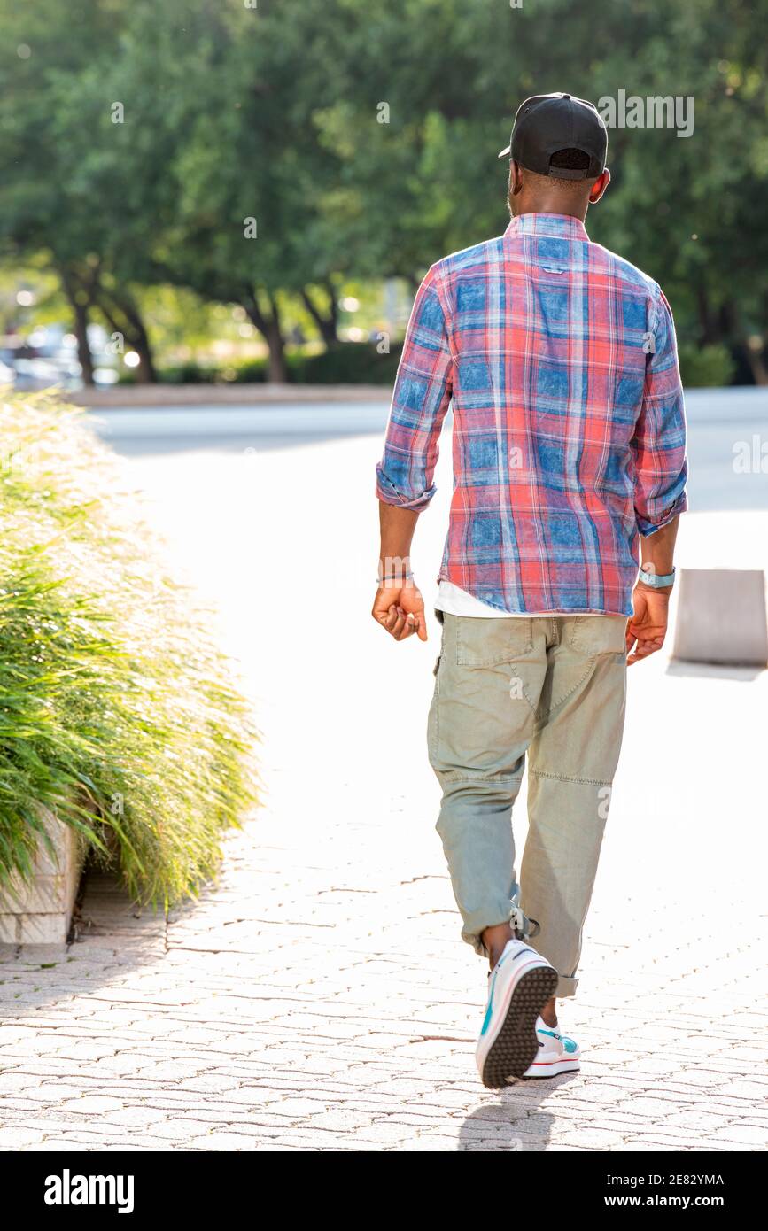 One african black man walking hi-res stock photography and images - Alamy