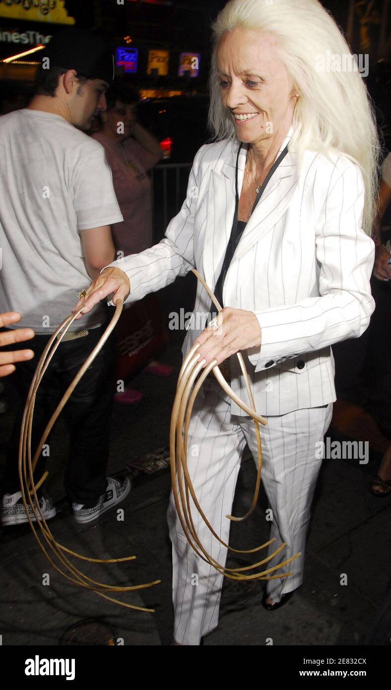 The Longest Recorded Fingernails, Lee Redmond poses at the Ripley's ...