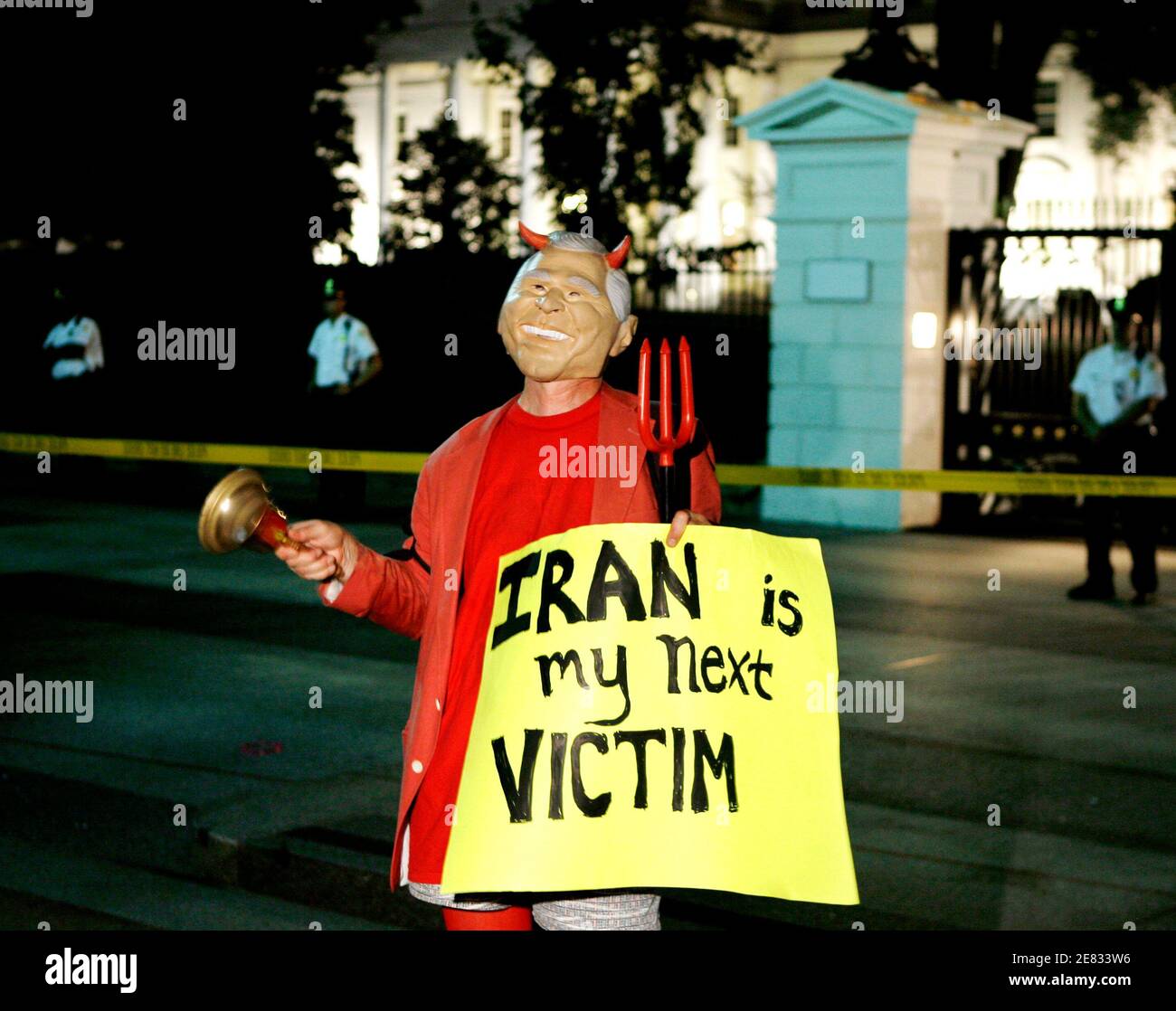 Wearing george bush mask hi-res stock photography and images - Alamy