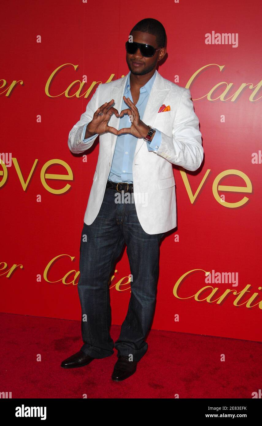 Singer Usher attends a cocktail party in celebration of The Cartier ...