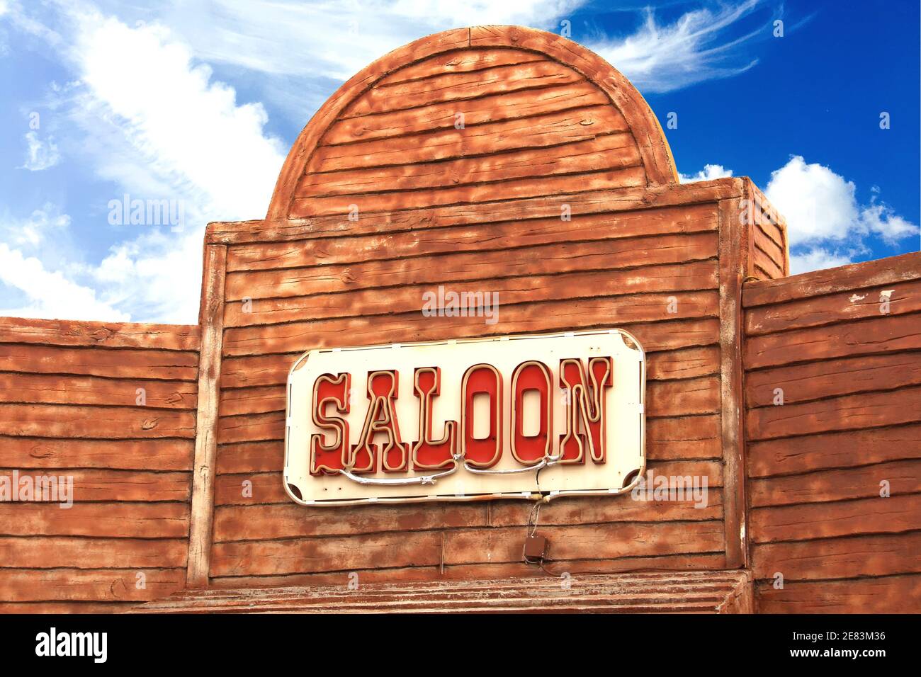 Western town saloon with various businesses Stock Photo - Alamy