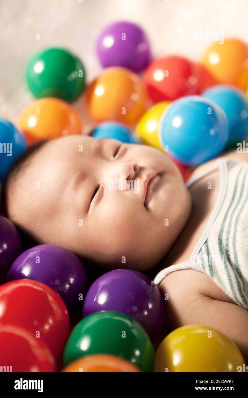 Side view asian boy ball hi-res stock photography and images - Alamy