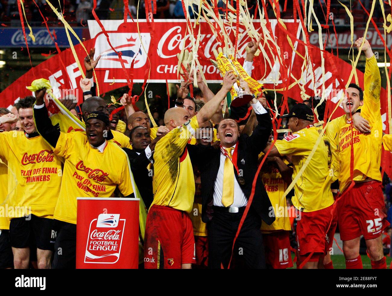 Watfords manager adrian boothroyd captain gavin mahon lift the trophy ...