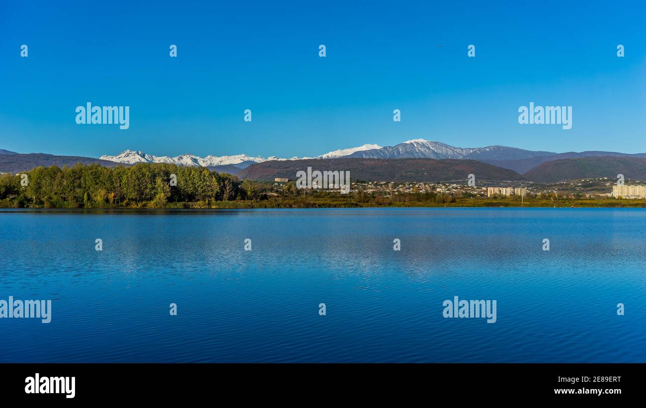 Landscape overlooking a beautiful lake surrounded by houses and ...