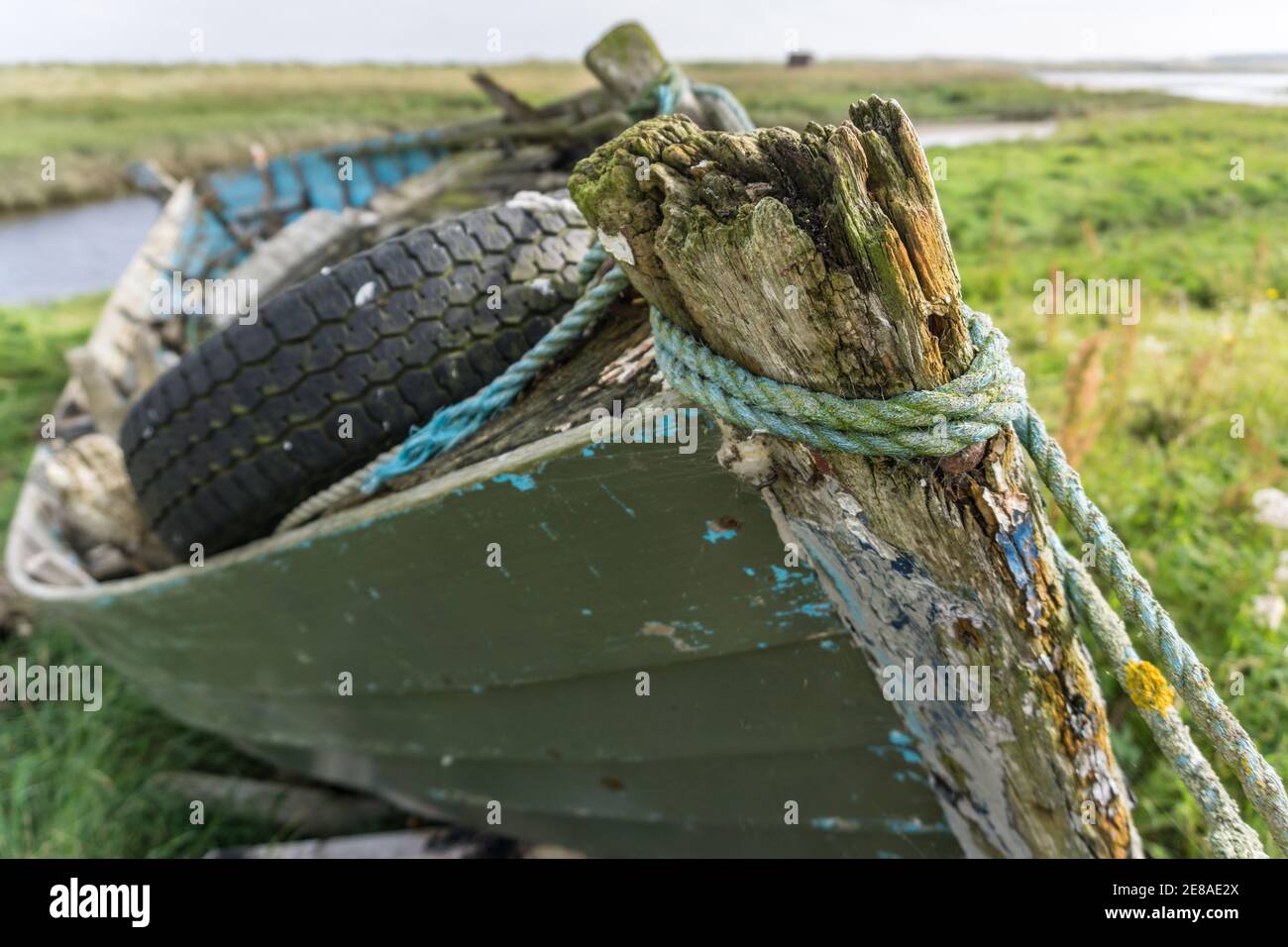 Abandoned wooden Montagu whaler boat on the sand dunes at St Cyrus on ...