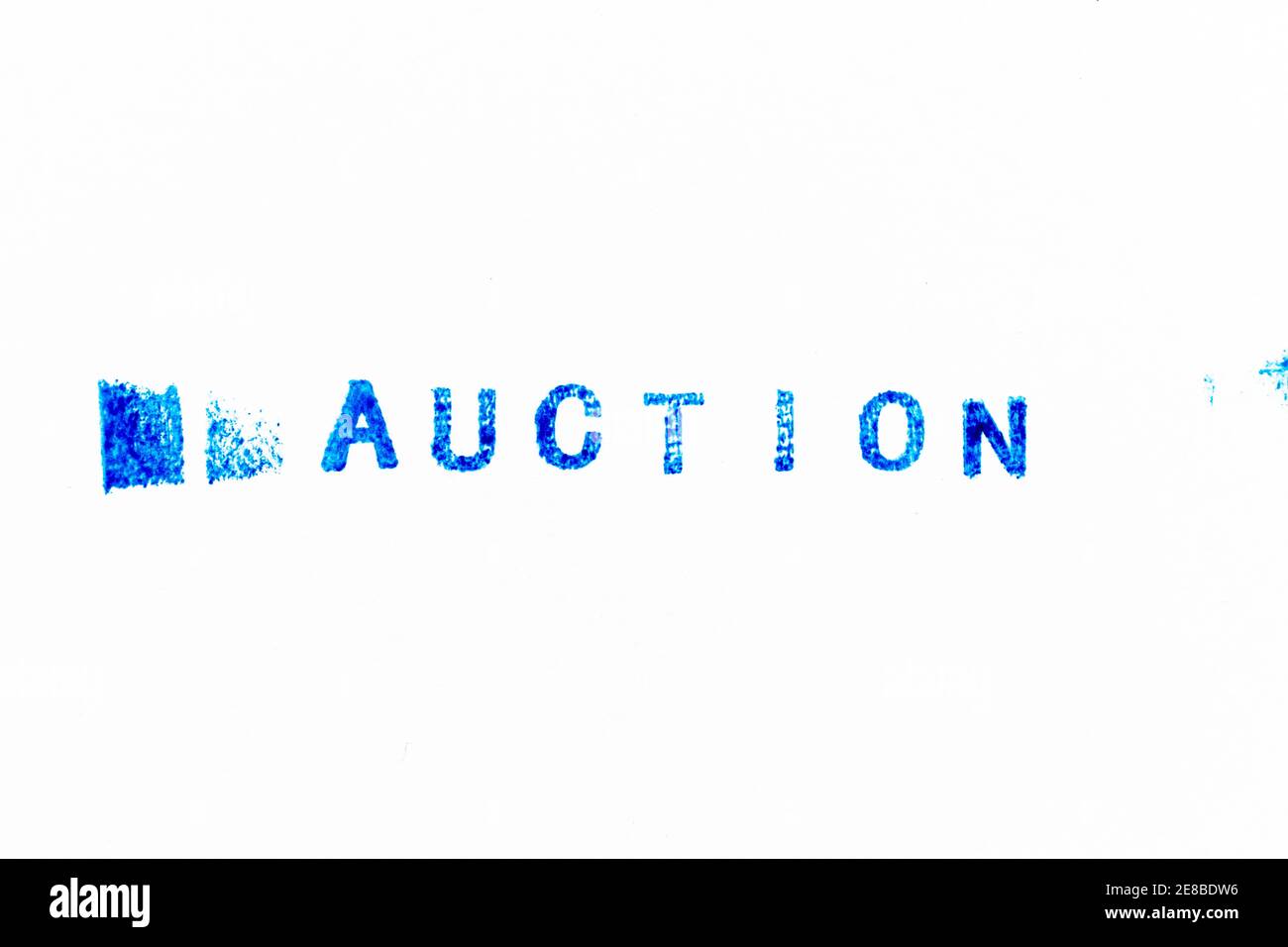 Blue color ink of rubber stamp in word auction on white paper ...