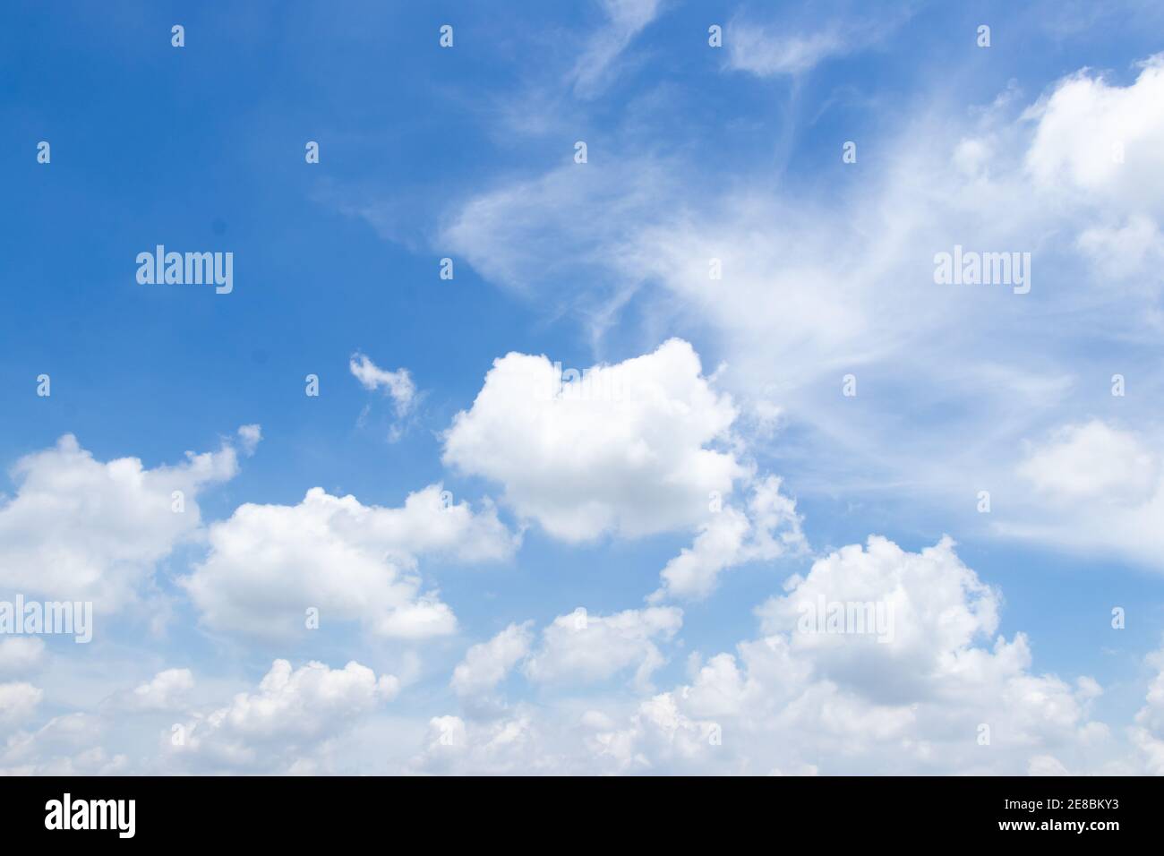 Clear blue color sky with white cloud background Stock Photo - Alamy