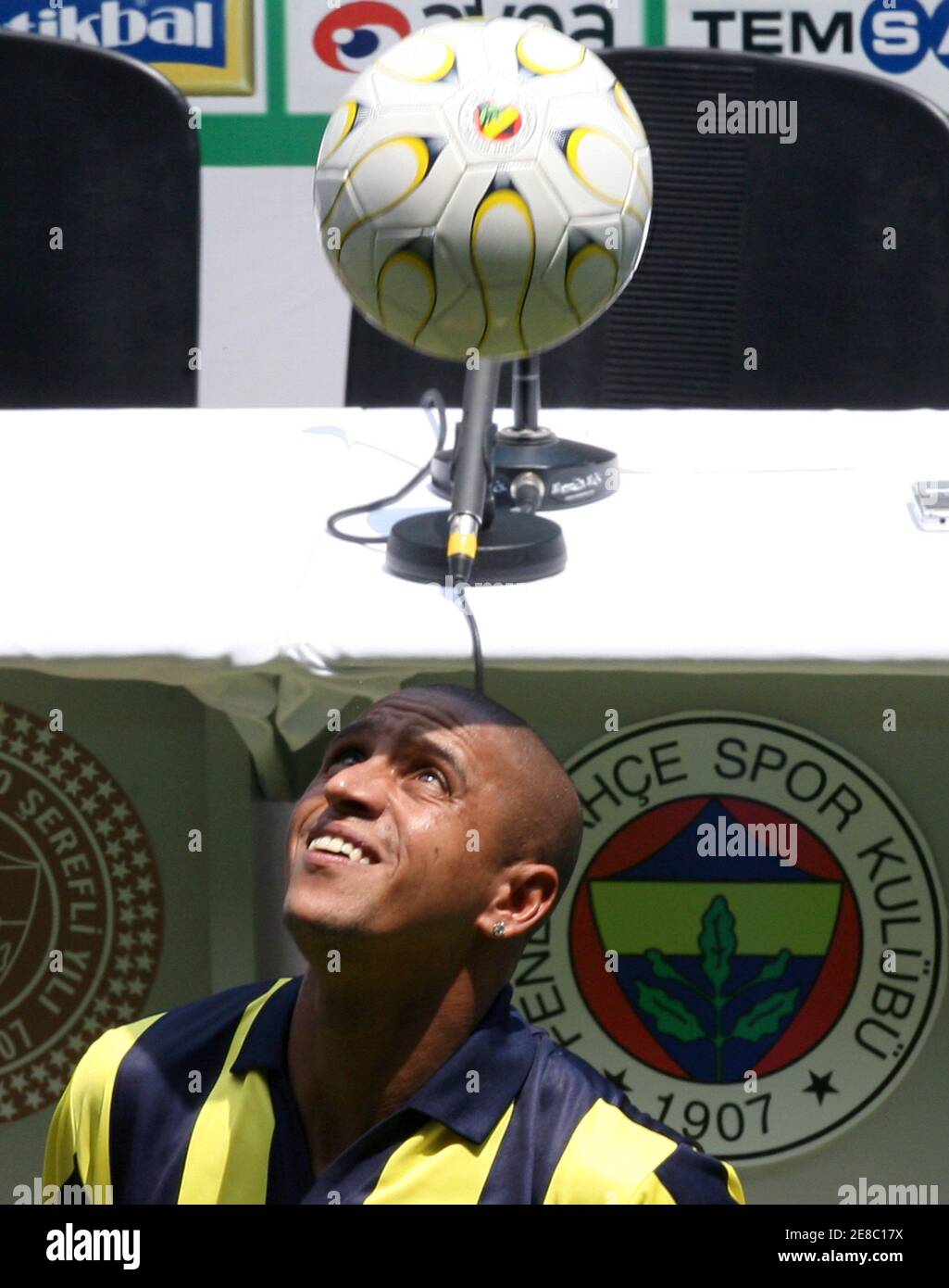 Soccer player signing soccer ball hi-res stock photography and images ...