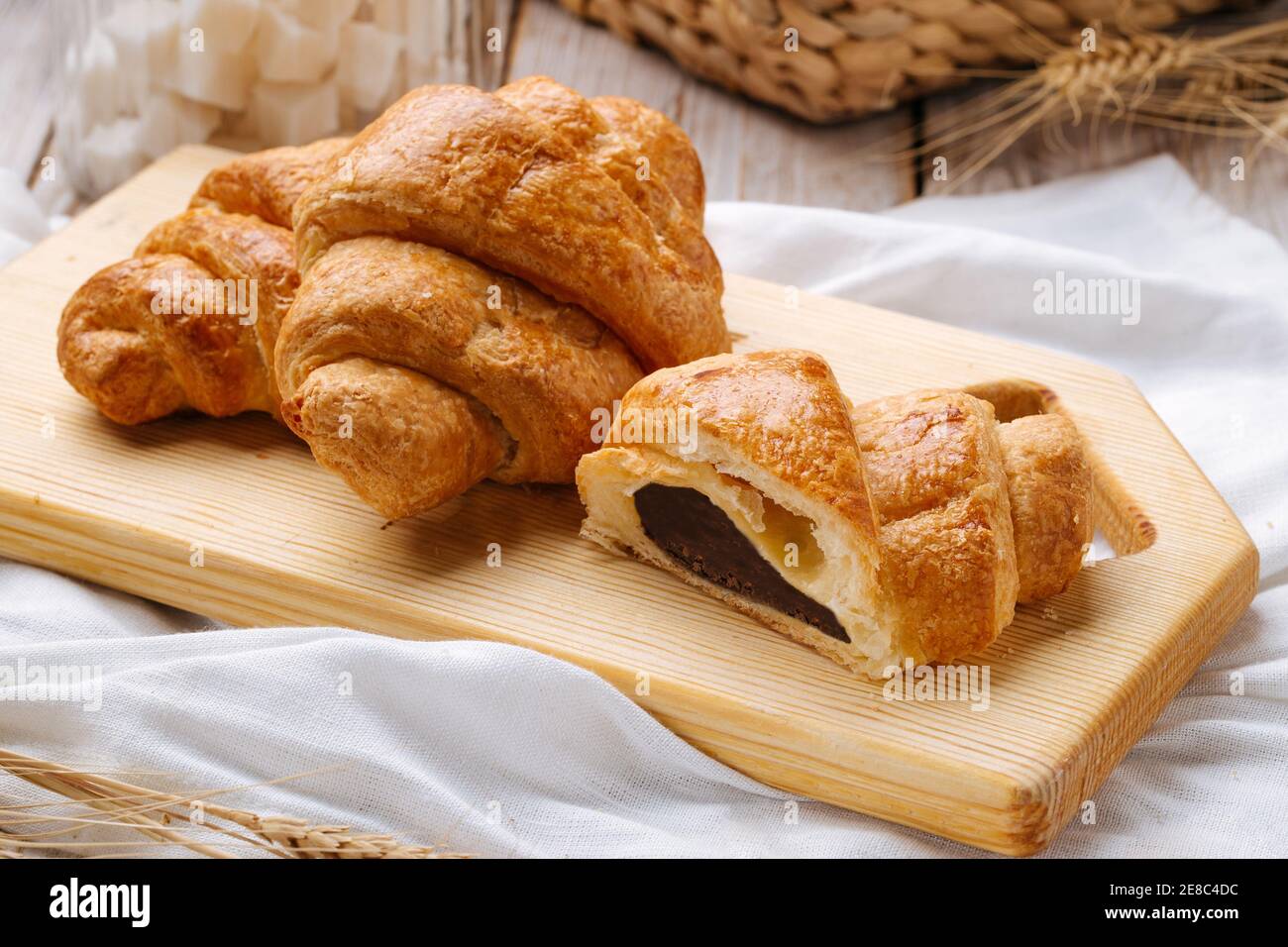 Closeup on french croissant with chocolate filling Stock Photo - Alamy