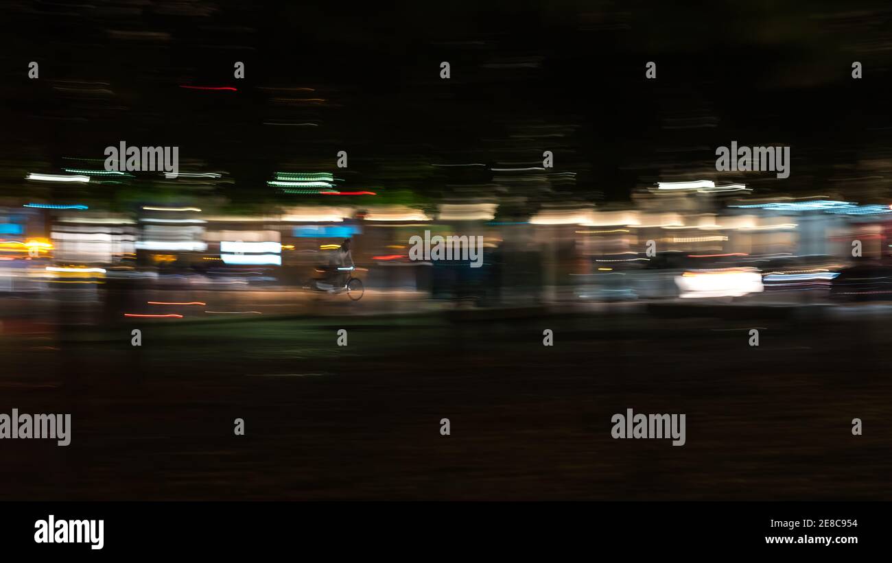 Boy riding bike night hi-res stock photography and images - Alamy