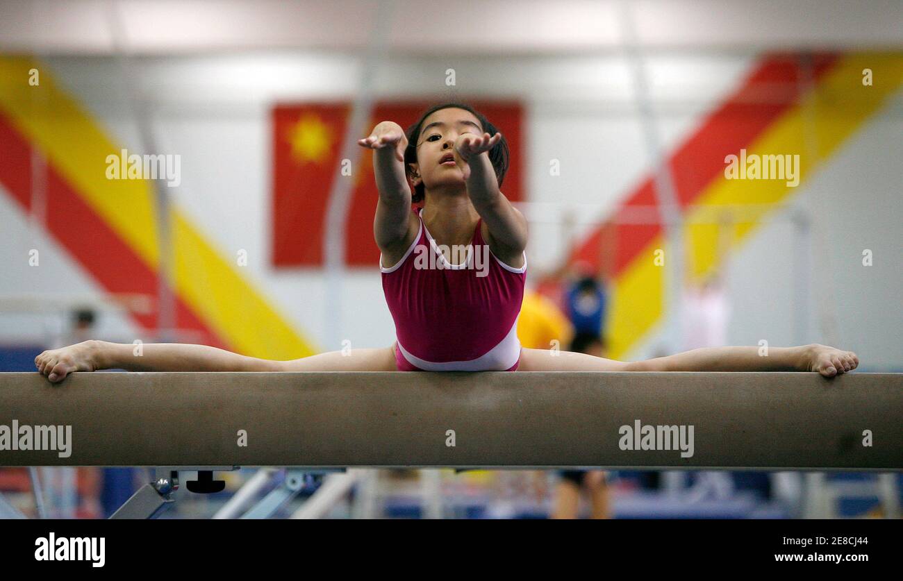 Female gymnast on beam in hi-res stock photography and images - Alamy