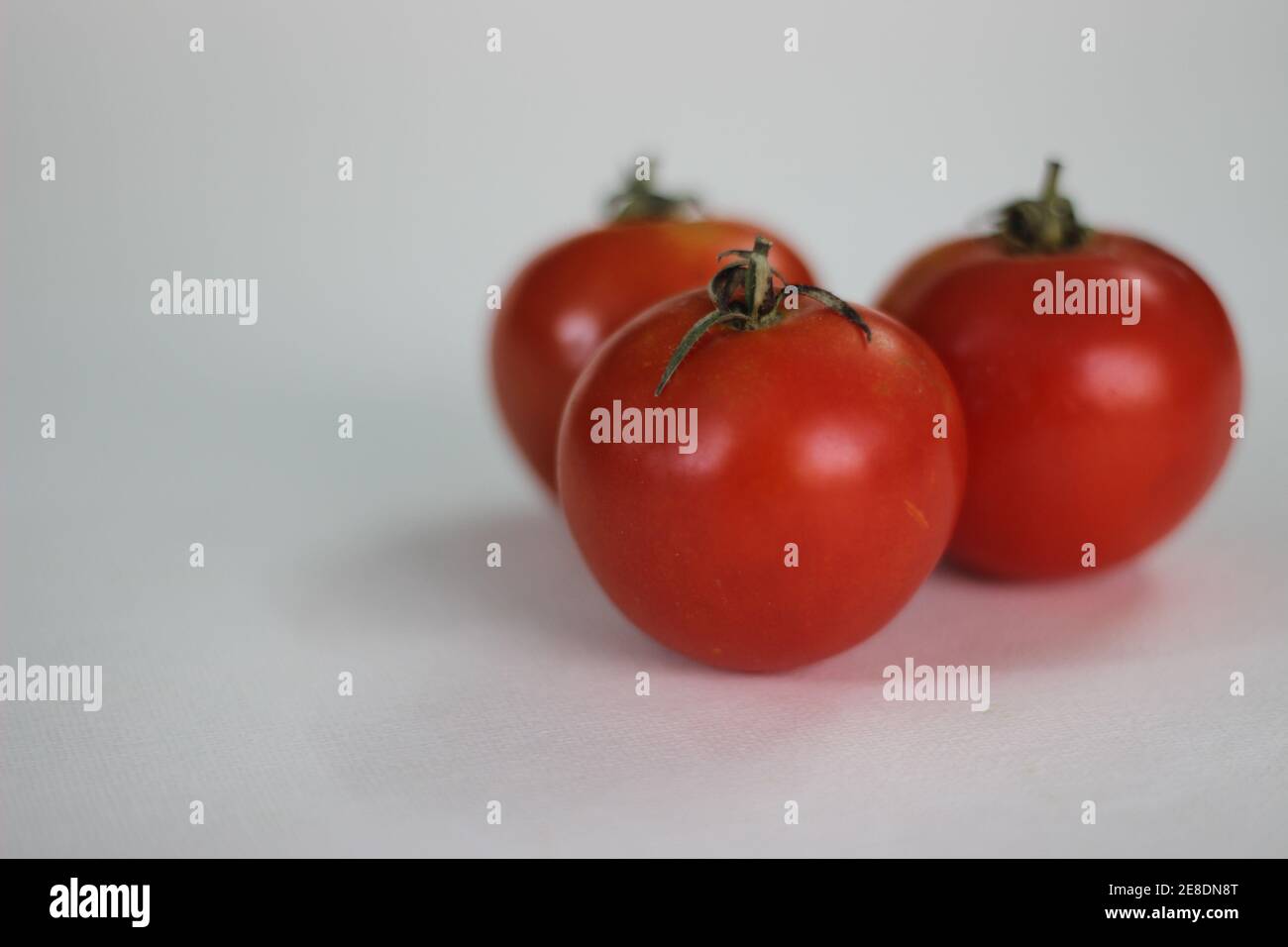 Fresh Local desi red tomatoes photographed on white background Stock ...
