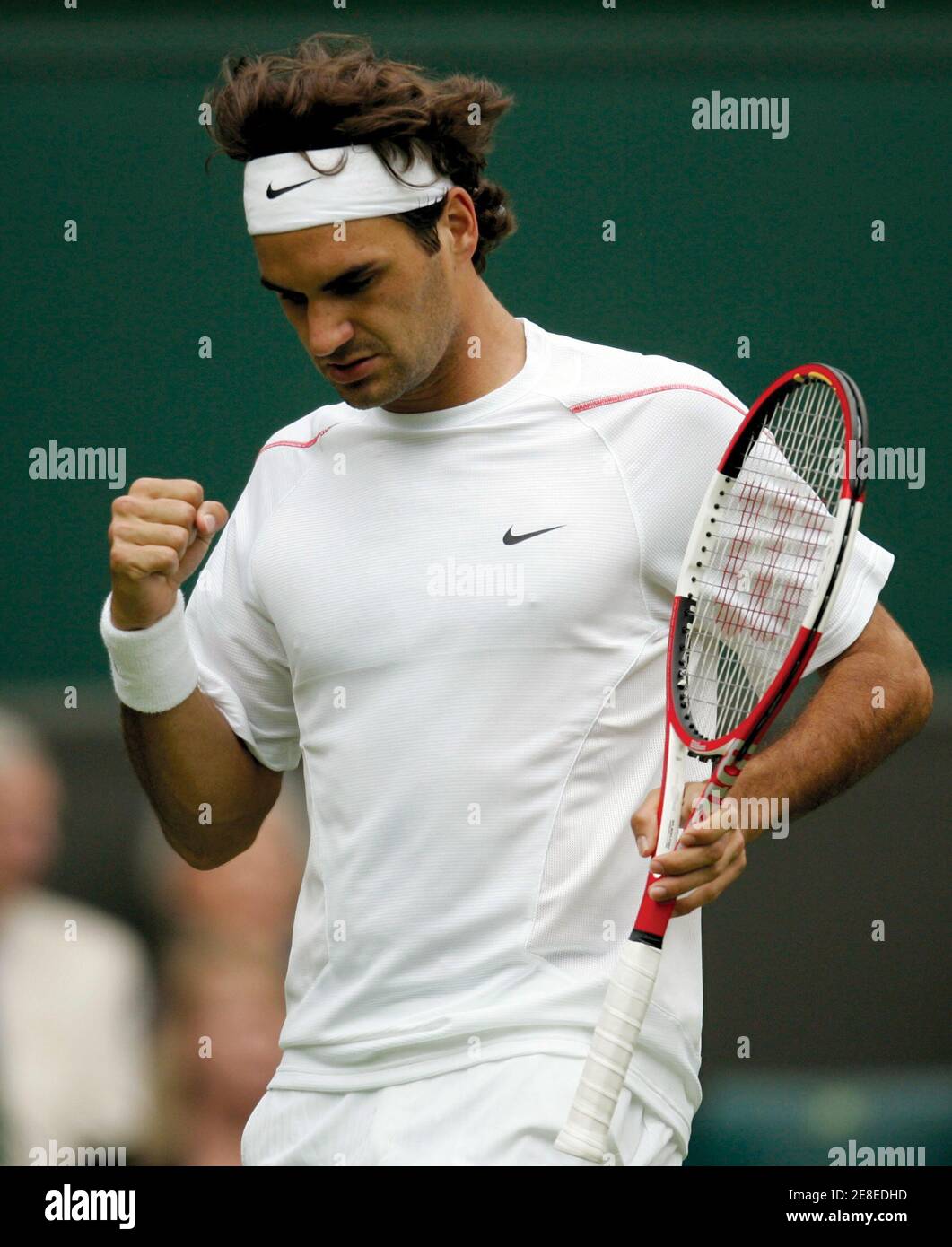Roger federer celebrates during his match against richard gasquet hi ...