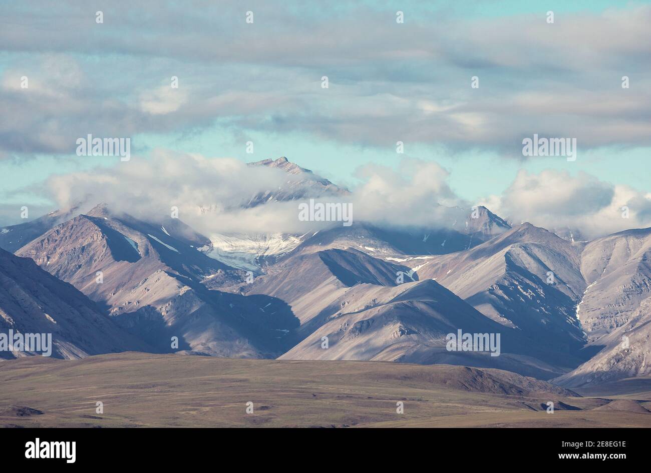 Picturesque Mountains of Alaska in summer. Snow covered massifs ...