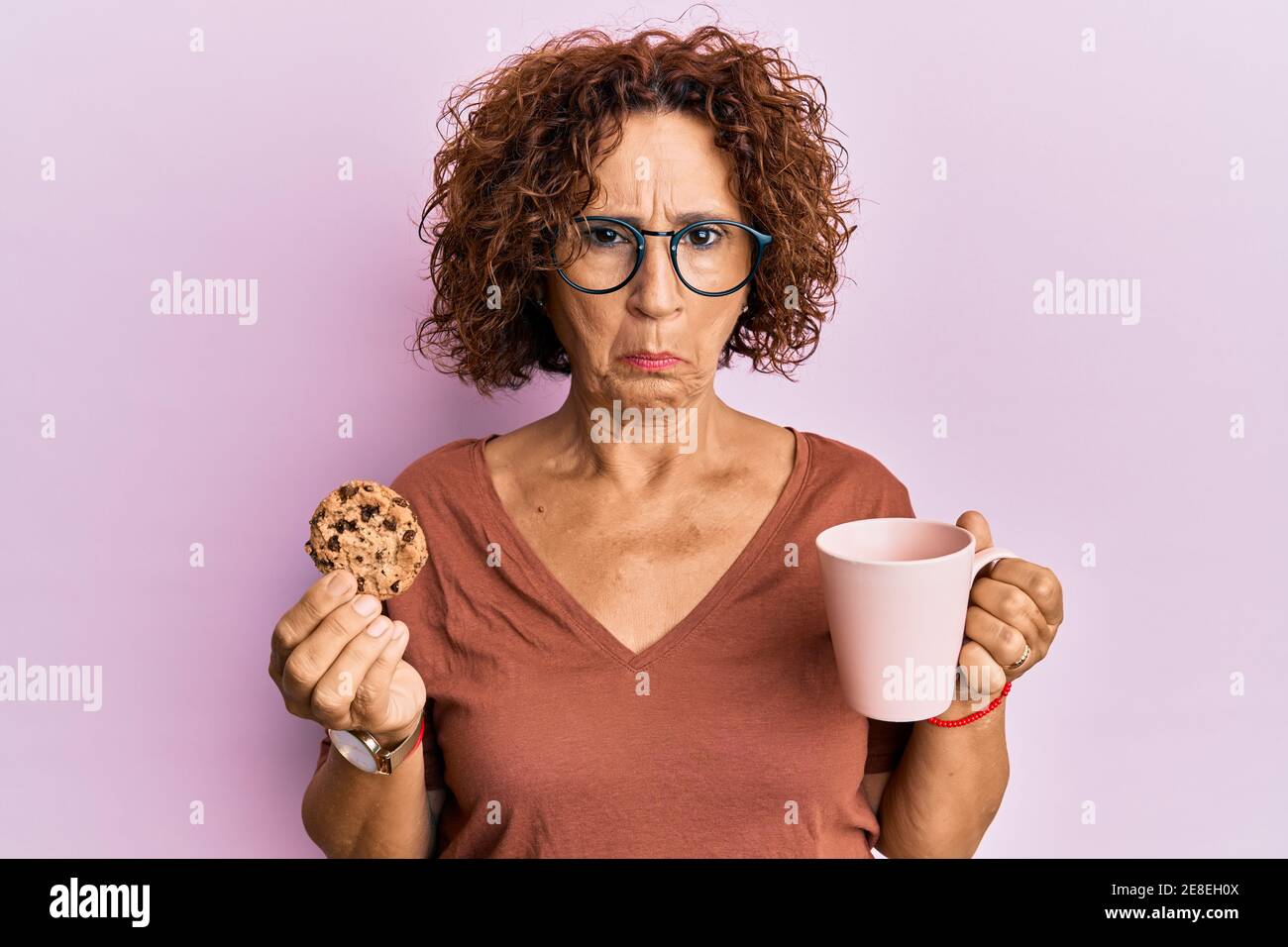 Woman and cookie and cry hi-res stock photography and images - Alamy