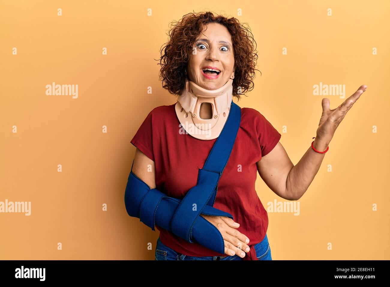 Beautiful middle age mature woman wearing cervical collar and arm on ...