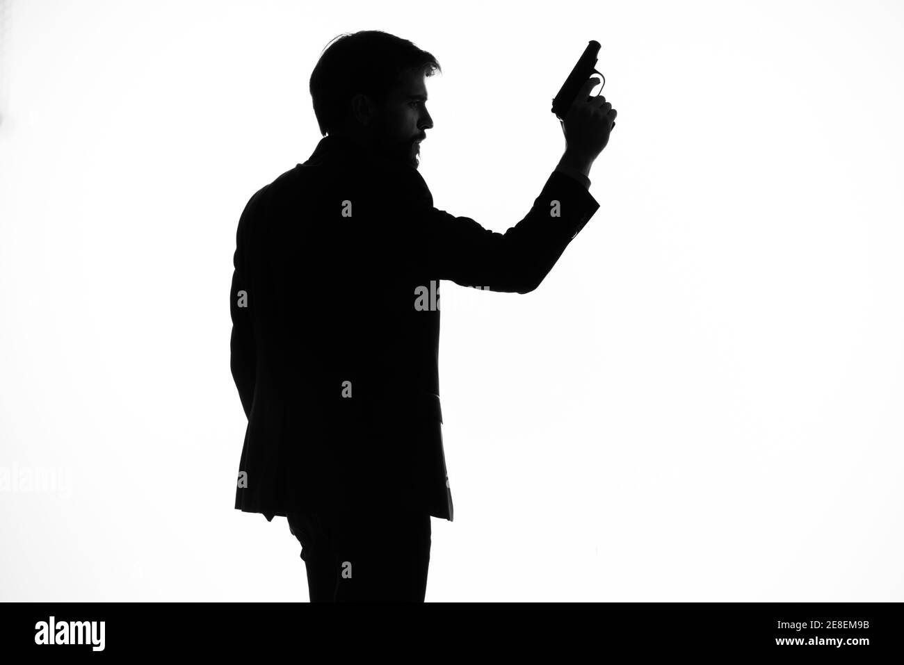 James bond pose gun hi-res stock photography and images - Alamy