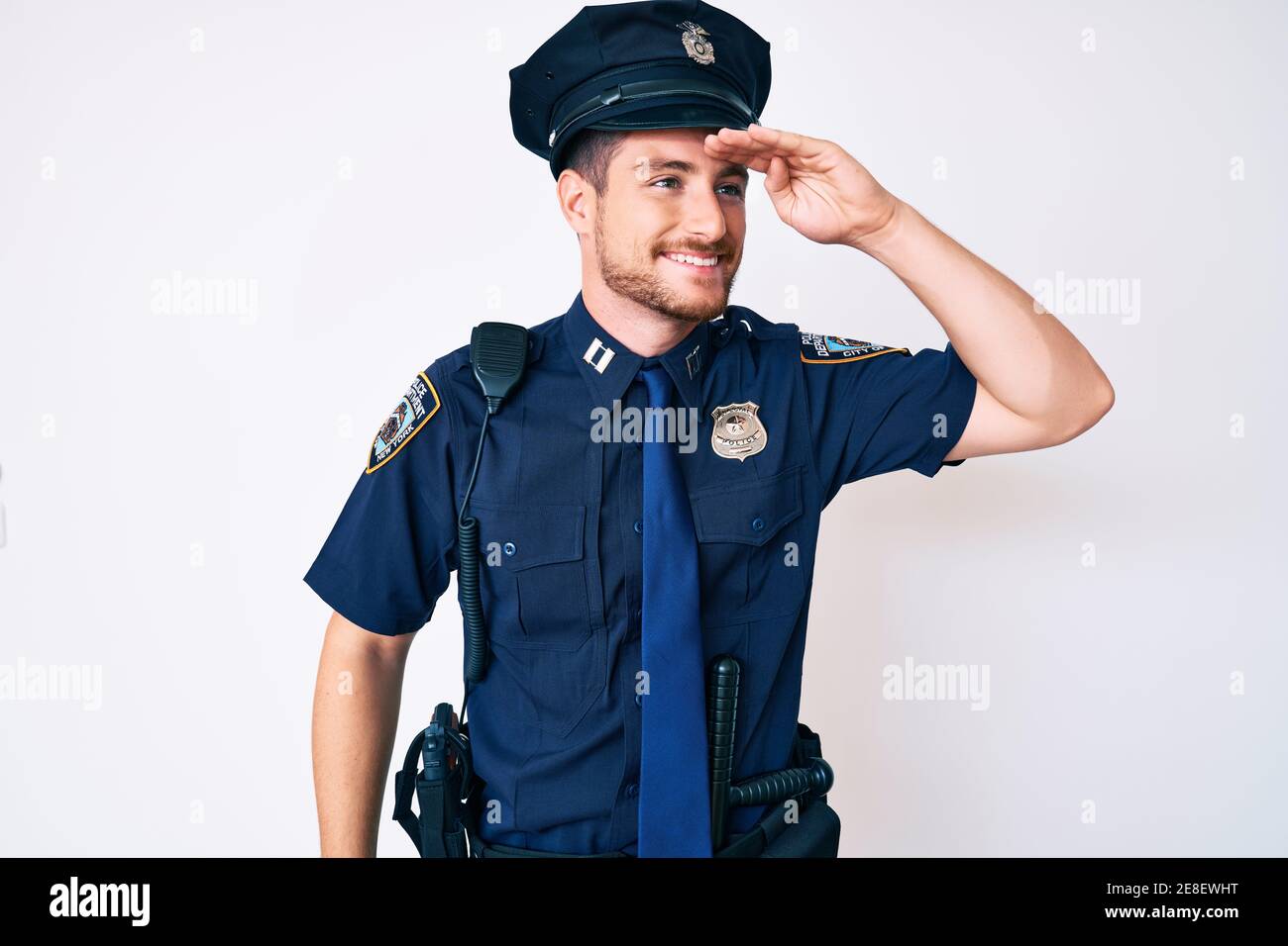 Young caucasian man wearing police uniform very happy and smiling ...