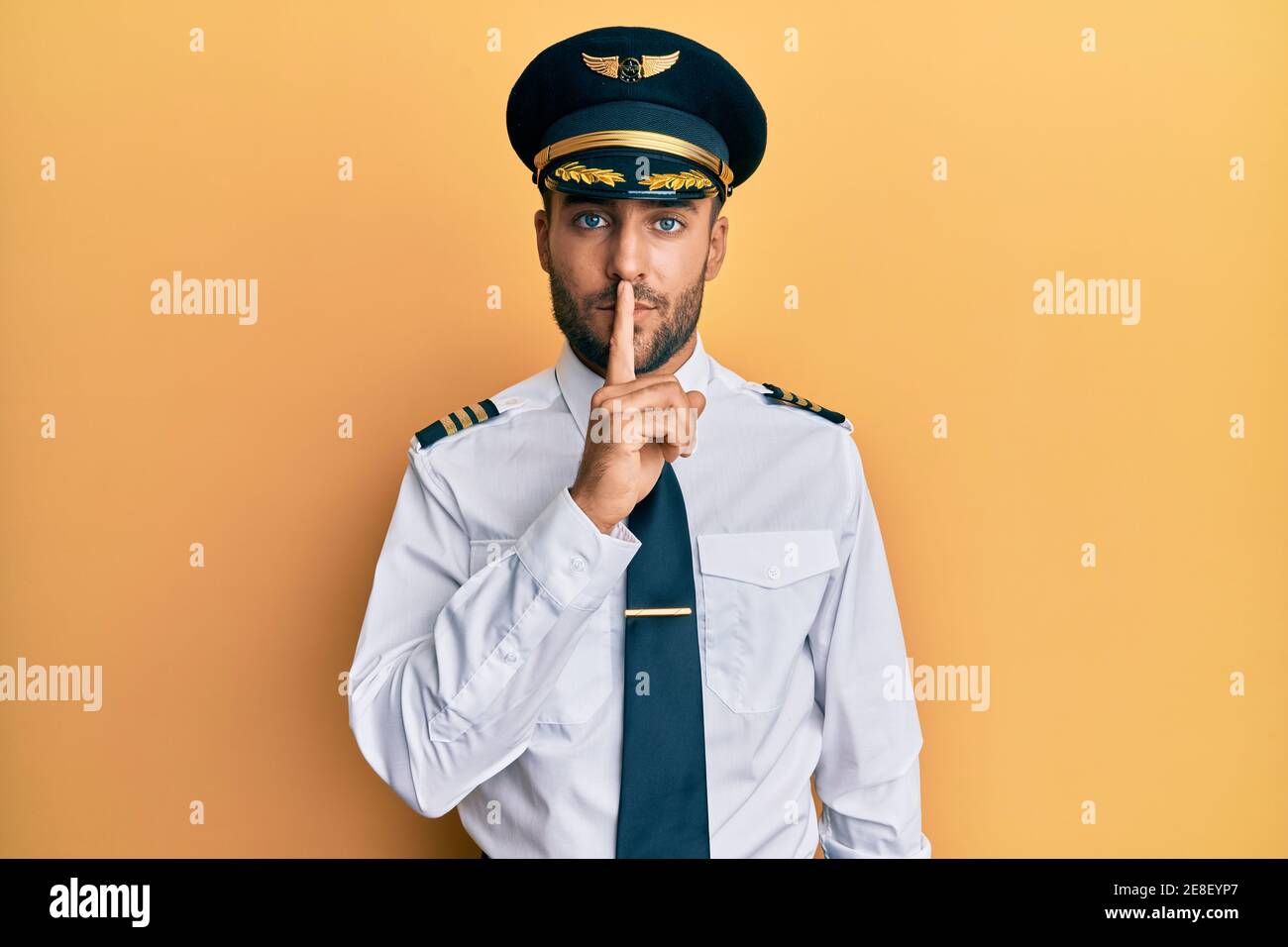 Handsome male pilot talking hi-res stock photography and images - Alamy