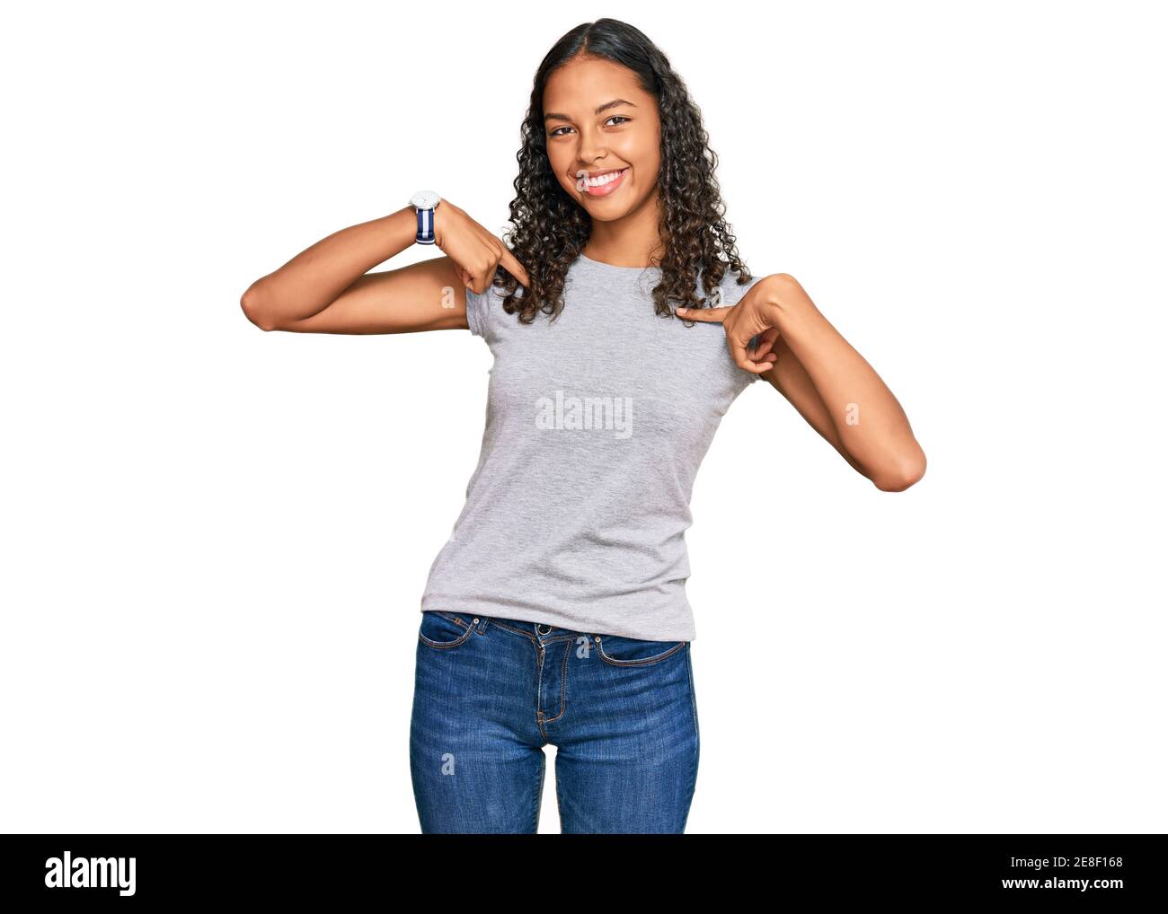 Young african american girl wearing casual clothes looking confident ...
