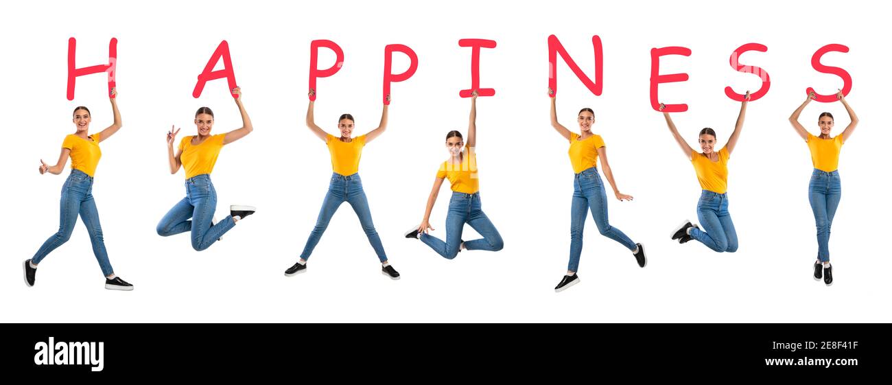 Woman jumping and holding letters forming word Happiness Stock Photo ...