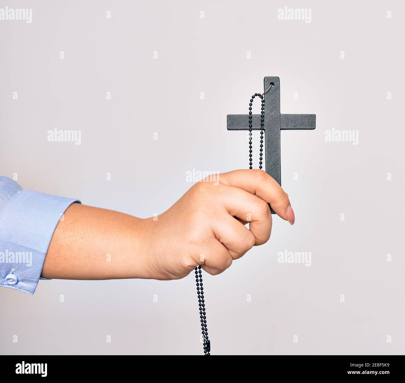Woman praying over jesus cross hi-res stock photography and images - Alamy