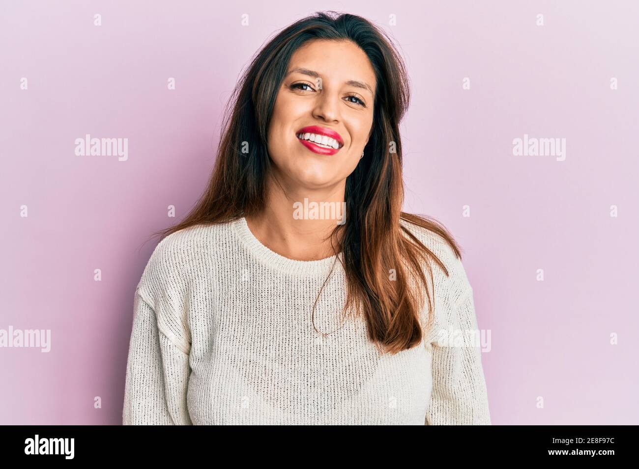 Beautiful hispanic woman wearing casual clothes with a happy and cool ...