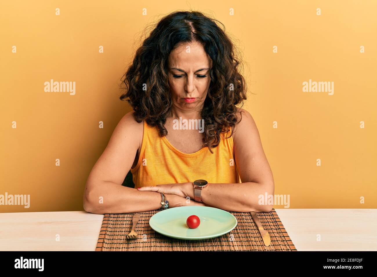 Beautiful middle age woman on a diet depressed and worry for distress ...