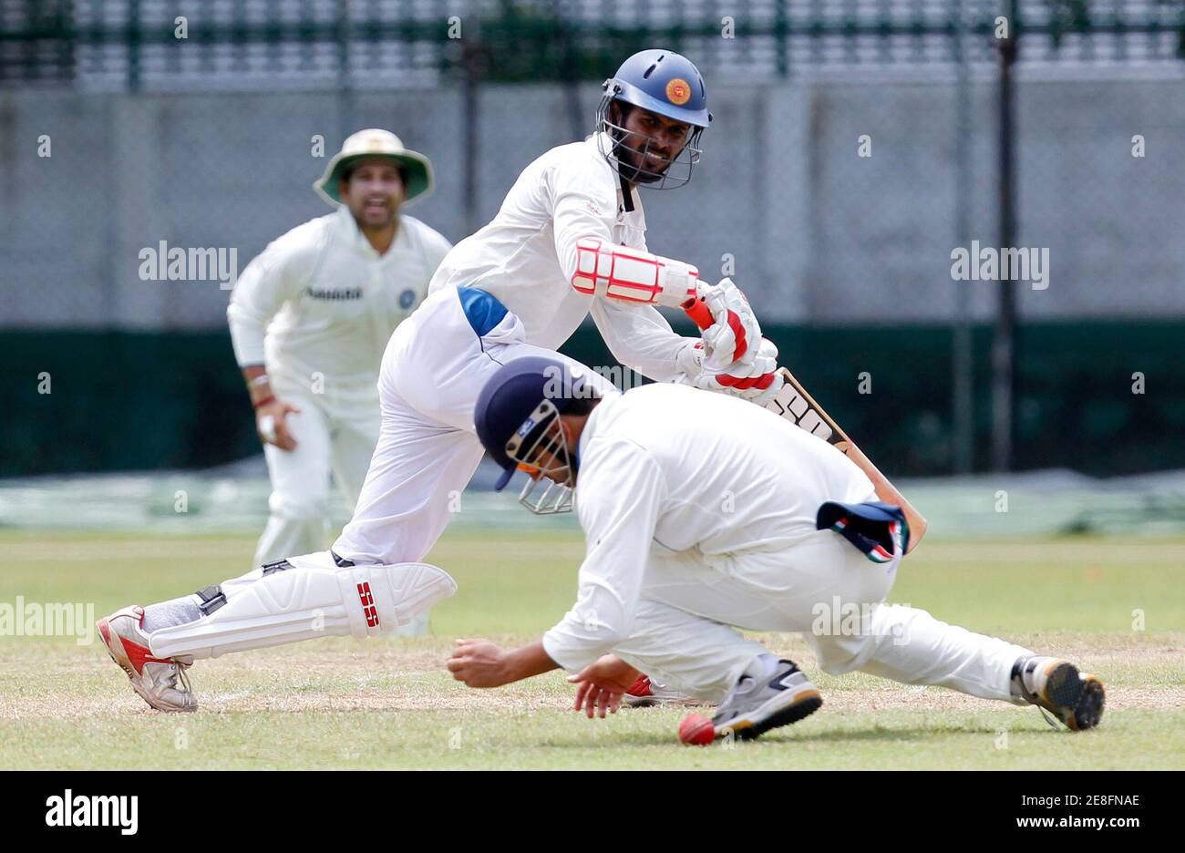 Passing ball cricket hi-res stock photography and images - Alamy