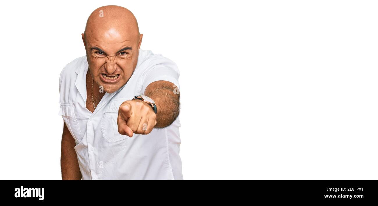 Mature middle east man with mustache wearing casual white shirt ...