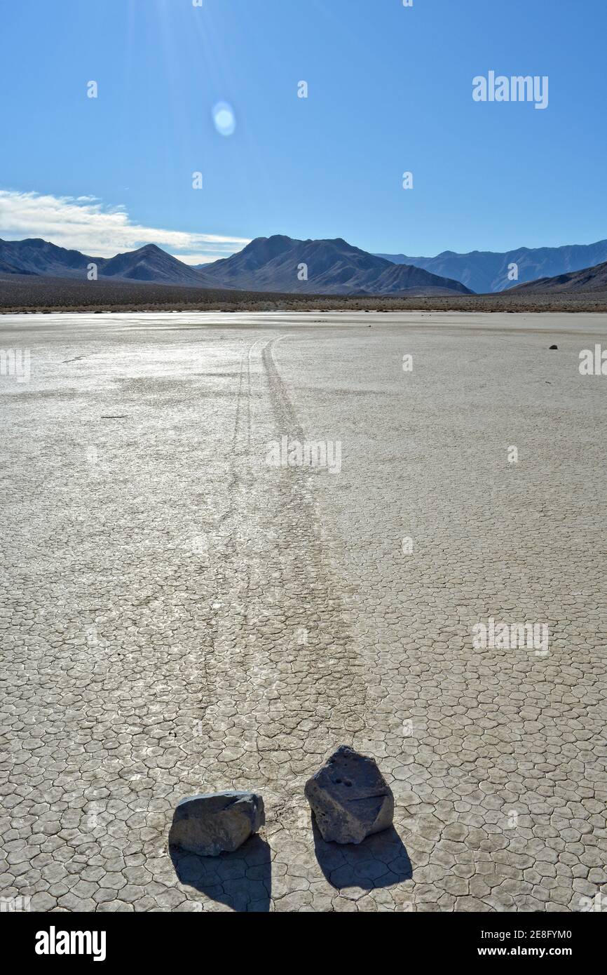 sailing rock leaving a long trail in the desert of the Racetrack Playa ...