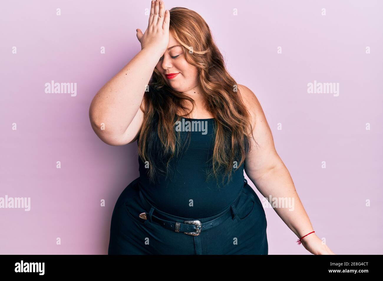 Plus Size Caucasian Young Woman Wearing Casual Clothes Over Pink