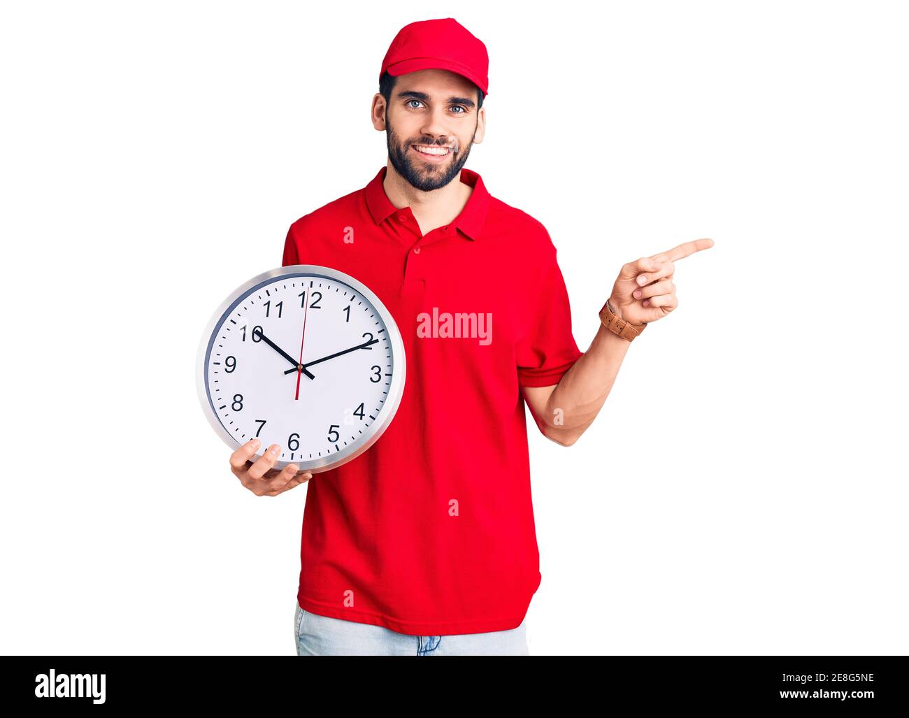 Young Handsome Man With Beard Wearing Delivery Uniform Holding Big