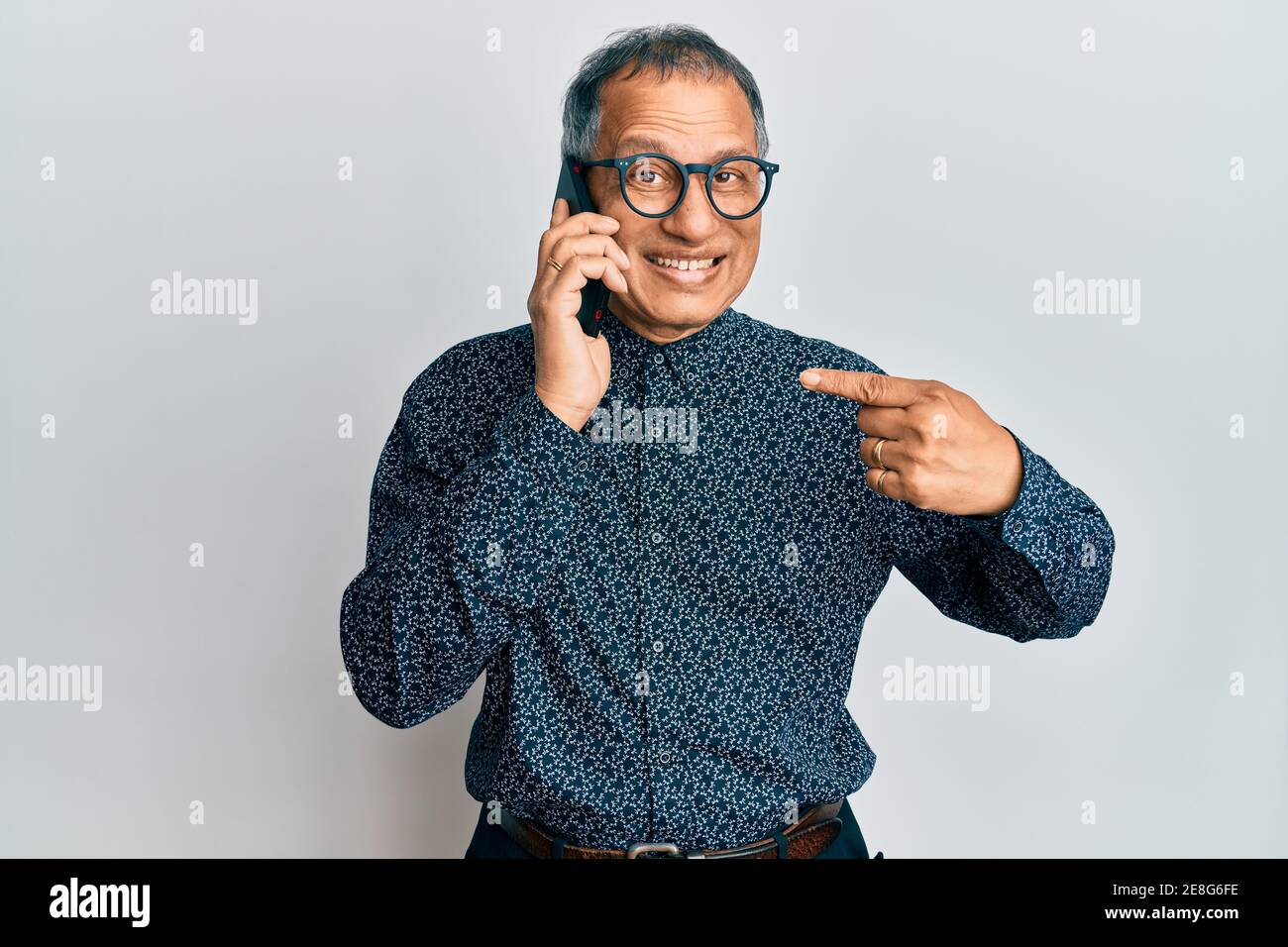 South indian man talking cell hi-res stock photography and images - Alamy