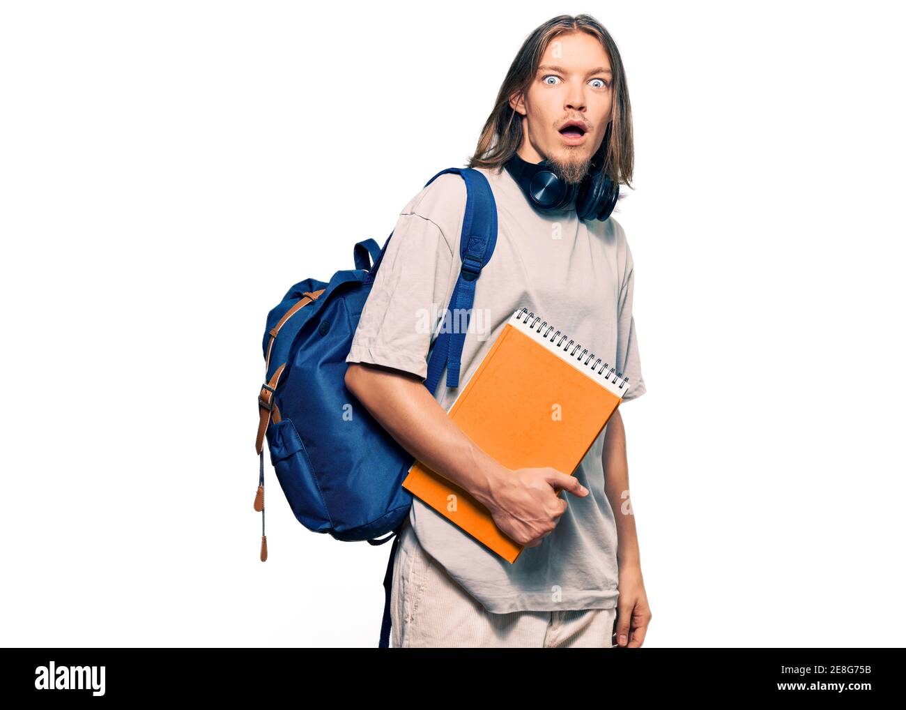 Scared male student books hi-res stock photography and images - Alamy