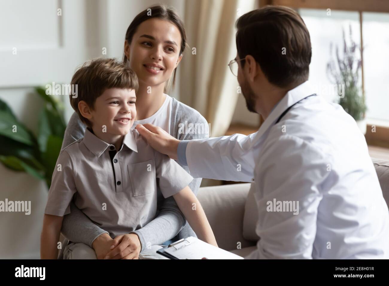 Doctor Caring Small Boy High Resolution Stock Photography and Images ...
