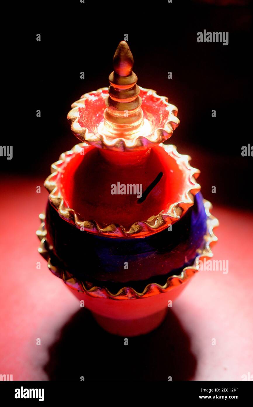 Traditional Indian Money Box - Lakshmir Bhandar Stock Photo - Alamy