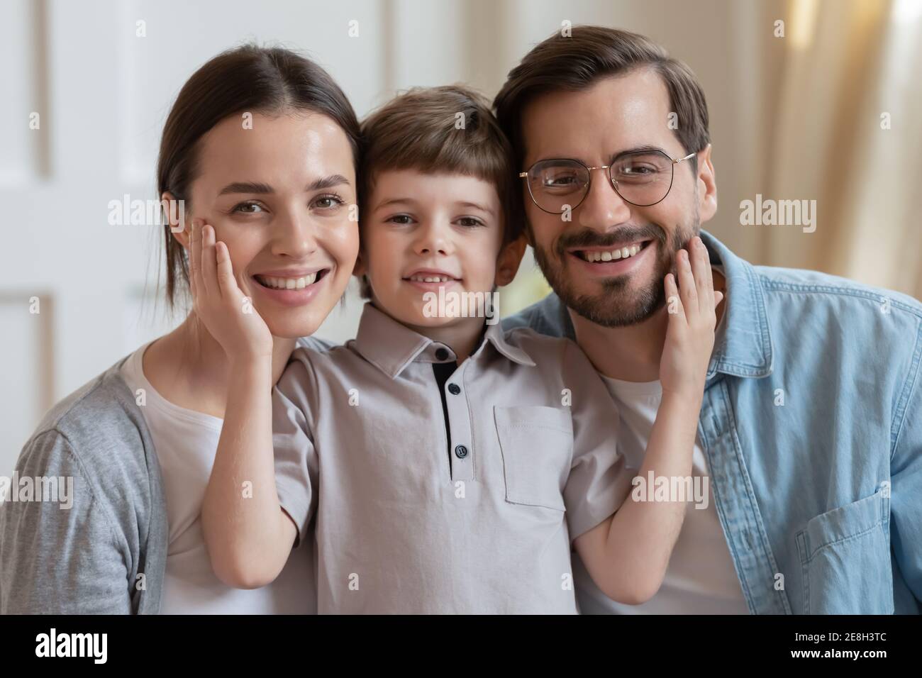Portrait of happy family with small boy child Stock Photo - Alamy