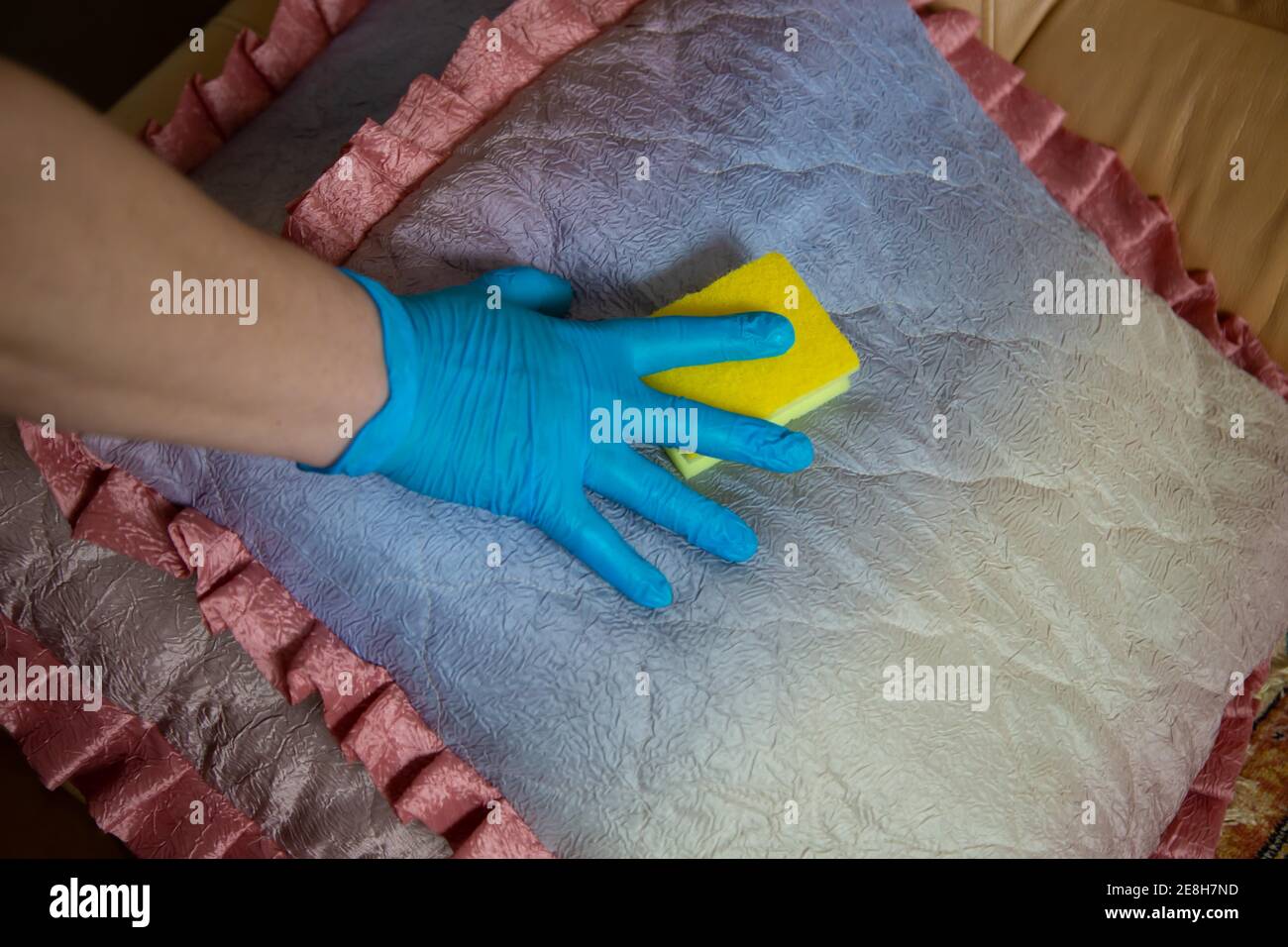 Cleaning with a sponge in a blue rubber glove 2021 Stock Photo - Alamy