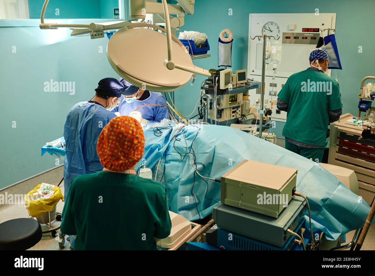From above back view of unrecognizable medical assistant leaving ...